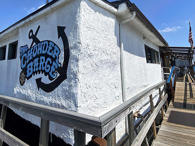 The floating culinary adventure begins! The Chowder Barge's unassuming exterior belies the maritime magic happening inside this Wilmington harbor gem.