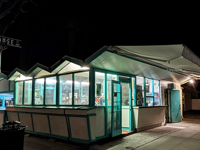 The unassuming teal-trimmed exterior of La Super-Rica might not scream "legendary tacos," but culinary pilgrimages rarely begin with fancy facades.