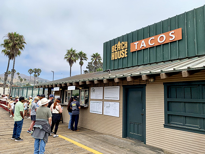 The green shack with the orange sign isn't trying to impress anyone&mdash;except your taste buds. California coastal dining at its most authentic.