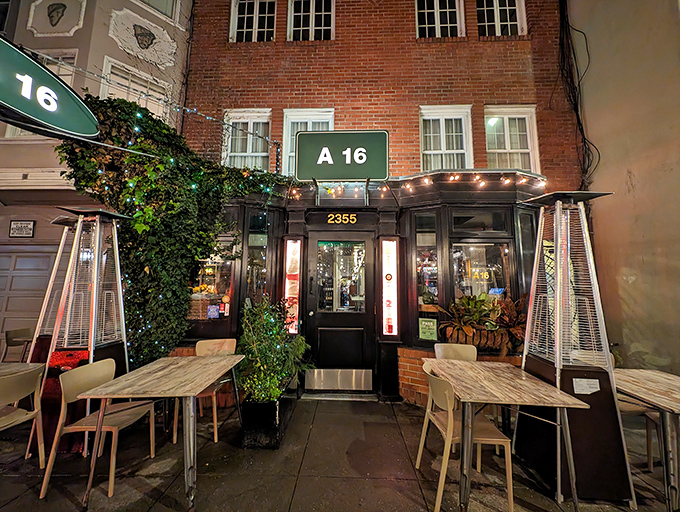 A16's sleek black exterior with mint-green signage stands like a culinary embassy from Southern Italy on San Francisco's Chestnut Street.