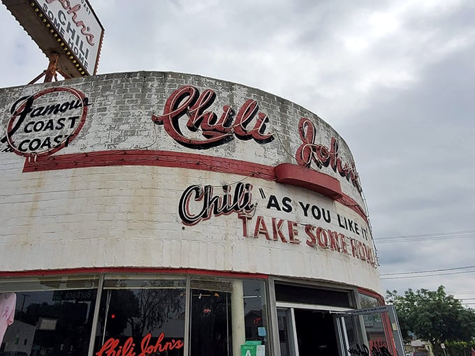 The iconic white exterior of Chili John's stands as a time capsule on Burbank Boulevard, complete with vintage signage that promises comfort in every bite.
