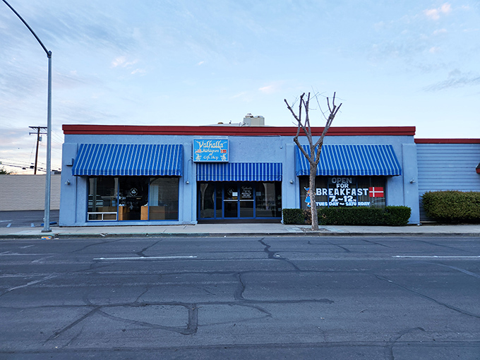 That iconic blue-and-white exterior with red trim isn't just eye-catching&mdash;it's a time portal to when dining out was an event worth dressing up for.