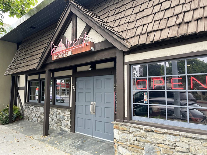 The cedar-shingled charm of Kathleen's exterior feels like a warm hug in restaurant form, promising comfort food treasures within those wooden doors.