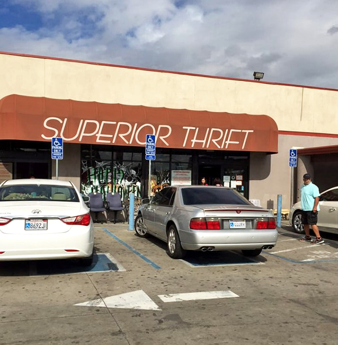 The unassuming orange awning of Superior Thrift beckons like a siren call to bargain hunters. Treasure awaits behind those doors!