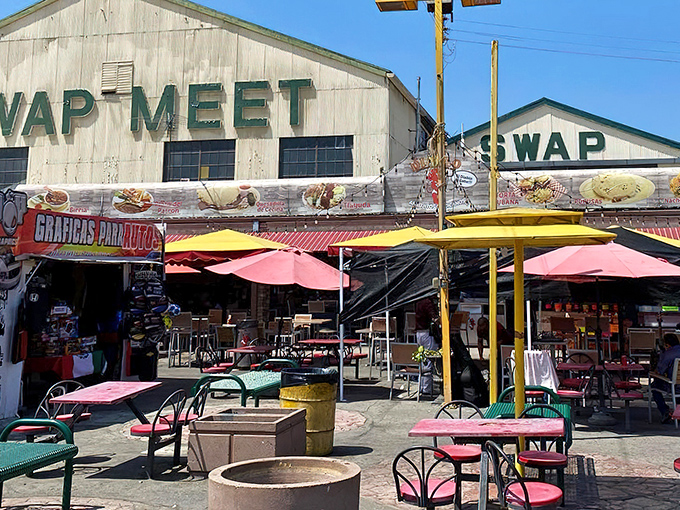 The iconic white buildings with bold green "SWAP MEET" lettering promise treasures inside that'll make your wallet sing with joy.