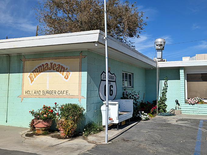 The mint-turquoise exterior isn't just a building&mdash;it's a time machine with a Route 66 shield as your boarding pass. 