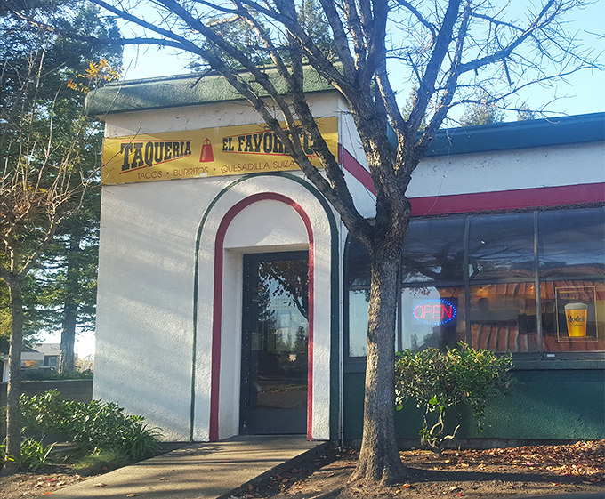 The unassuming exterior of Taqueria El Favorito might not stop traffic, but locals know this modest facade hides culinary treasures worth seeking out.