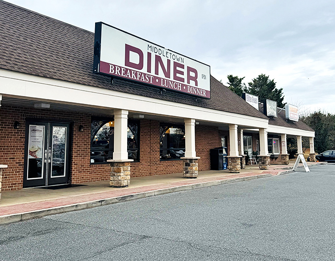 The red sign beckons like a lighthouse for hungry travelers. No fancy frills needed when what awaits inside is pure breakfast bliss.