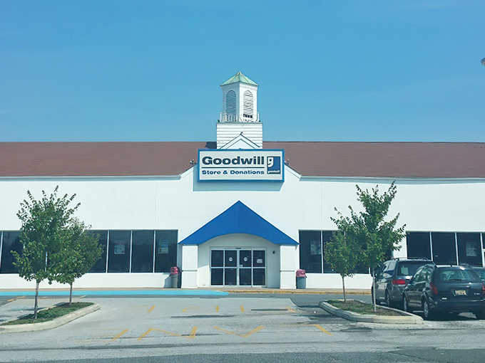 The distinctive white building with blue trim and cupola stands like a beacon for bargain hunters across Delaware, promising adventures in affordability.
