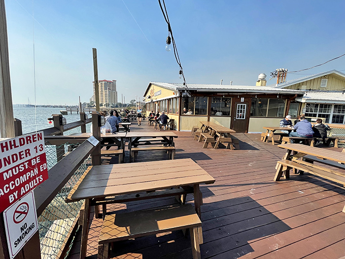 The waterfront deck at The Shack isn't just seating&mdash;it's front-row tickets to nature's best show. Gulf views and seafood: Florida's perfect pairing.