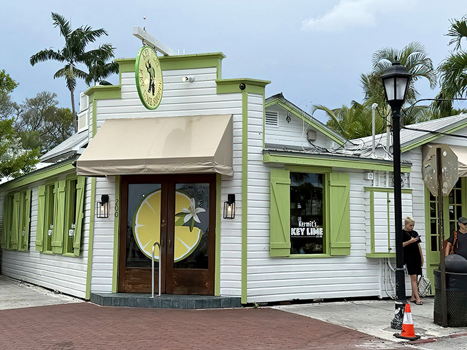 The pristine white building with green trim stands like a tropical beacon on the corner of Elizabeth and Greene Streets, promising citrusy salvation to all who enter.