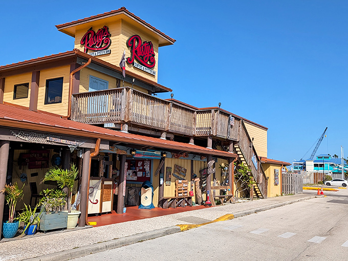 The sunshine-yellow exterior of Rusty's stands like a beacon for seafood lovers, promising coastal delights with that unmistakable Old Florida charm.