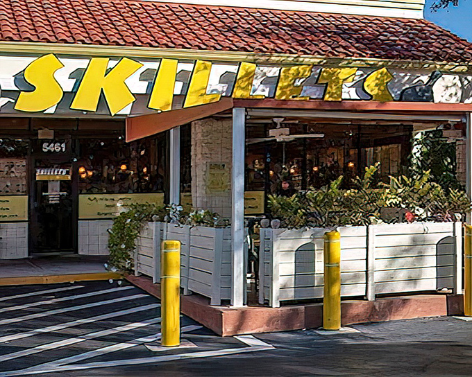 The bright yellow sign beckons like a culinary lighthouse on Airport-Pulling Road, promising comfort food treasures within those terra cotta-roofed walls.