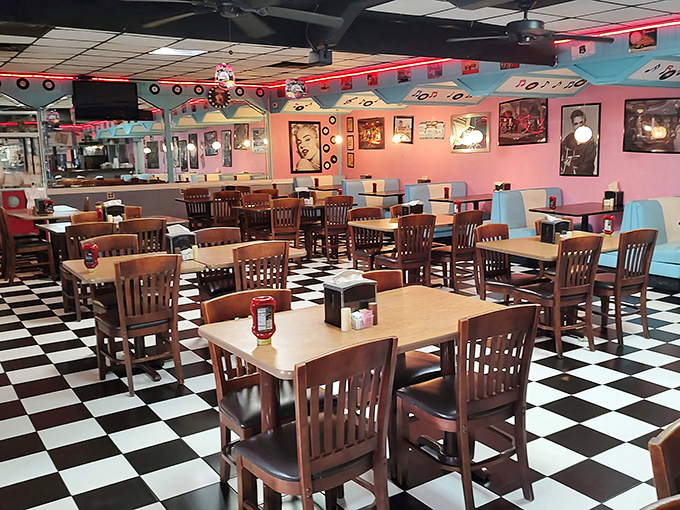 The classic checkered border on this sign isn't just decoration&mdash;it's a promise that what awaits inside is the real deal, no fancy pretensions required.