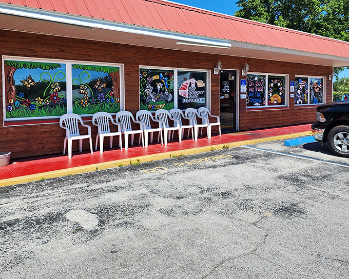 The unassuming exterior of The Biscuit Barn proves once again that the best breakfast spots often hide behind modest facades. Those colorful window paintings promise delicious things inside.