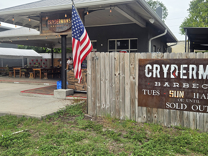 The weathered wooden sign and American flag announce your arrival at barbecue nirvana. Prepare for a Texas-sized experience in the heart of Florida.