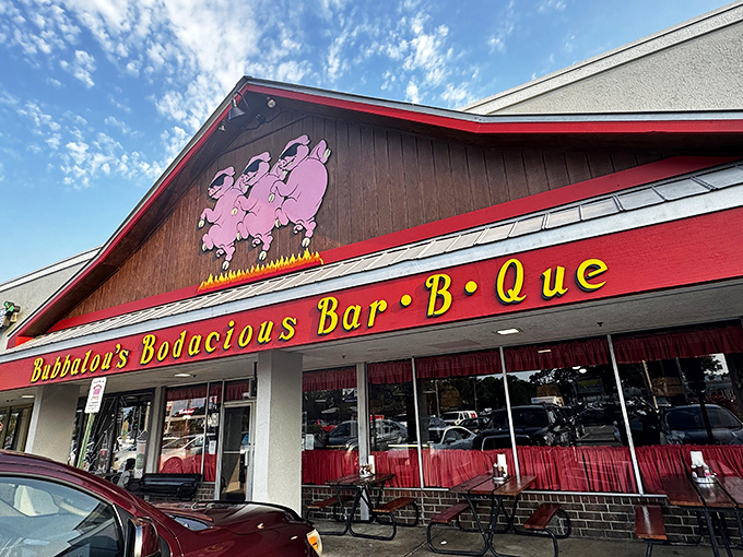 The three dancing pigs on Bubbalou's facade aren't just a logo—they're a promise of the smoky paradise awaiting inside this Orlando BBQ institution.