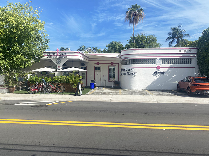 The Art Deco curves and pink trim of Eaton Street Seafood Market stand out like a stylish 1930s starlet who happens to serve incredible seafood.