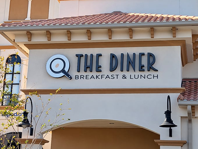 Spanish-style architecture meets breakfast paradise at @ The Diner, where Orlando's food pilgrims gather for morning magic away from the theme park madness.