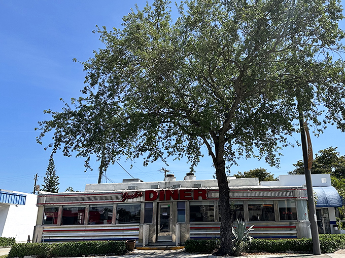 That gleaming stainless steel exterior isn't just eye-catching&mdash;it's a time machine disguised as a diner. Classic Americana with a Florida twist!