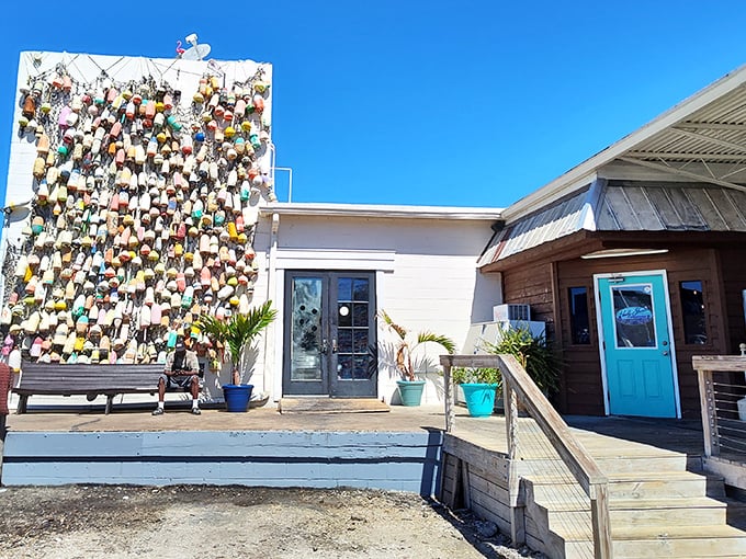 The wall of colorful buoys isn't just decoration&mdash;it's a maritime r&eacute;sum&eacute; telling stories of waters navigated and catches landed.