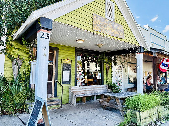 The lime-green cottage with "Hole Is The Wall" emblazoned above the door isn't trying to be fancy&mdash;it's promising something better: authenticity with a side of seafood perfection.