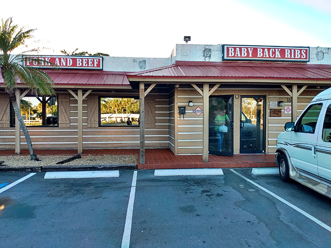 The unassuming wooden exterior of Smoke'n Pit screams "authentic barbecue inside!" Those rooftop signs aren't lying&mdash;this place means serious meat business.