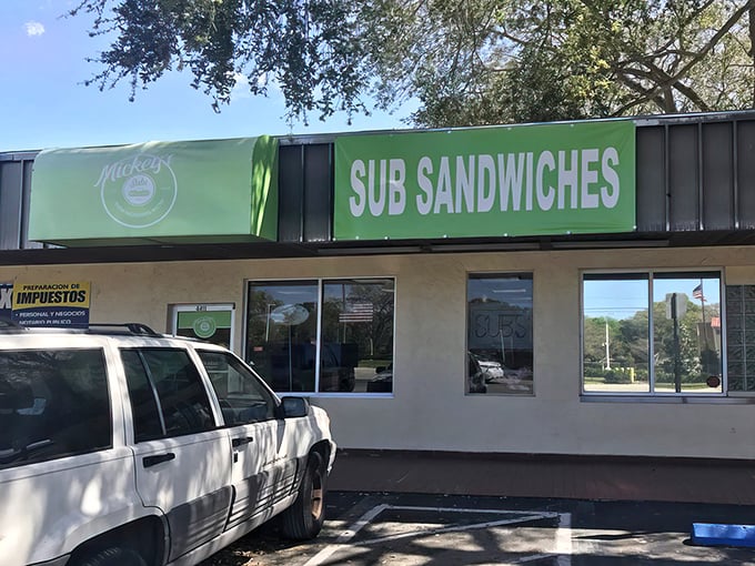 The unassuming green storefront of Mickey's Subs stands as a beacon of sandwich salvation for Tampa locals who know that culinary treasures often hide in plain sight.