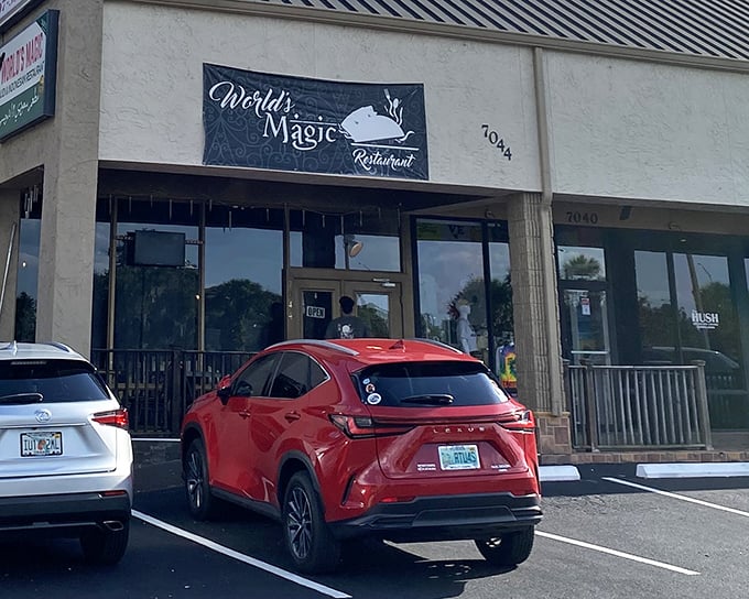 The unassuming exterior of World's Magic Restaurant hides culinary treasures within. Like finding a diamond in a strip mall, this Orlando gem rewards those who venture inside.