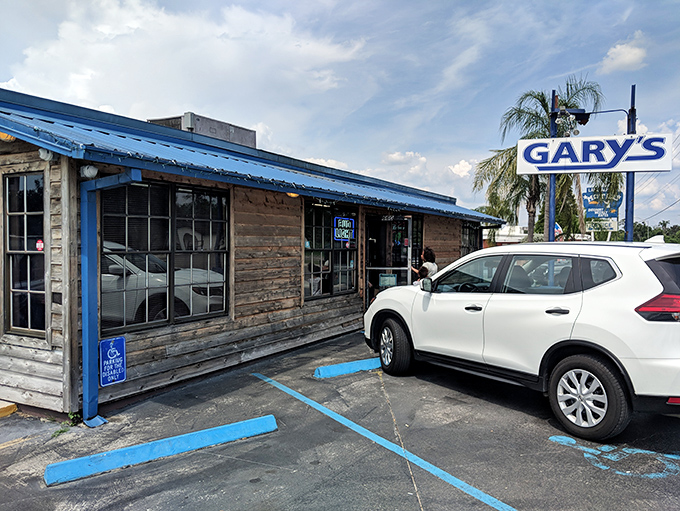 The unassuming wooden exterior of Gary's might not scream "culinary destination," but that blue sign has been guiding hungry seafood lovers for decades.