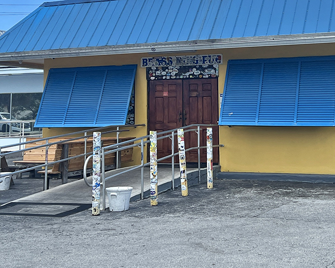 The unassuming yellow exterior with bright blue shutters hides a burger paradise. Like finding a treasure chest at the end of a delicious rainbow.