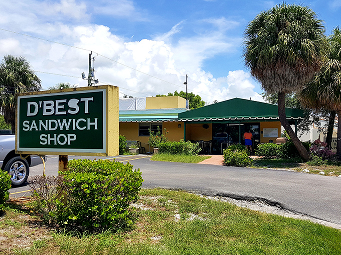 The unassuming yellow building with its green awning and sign might not look like a culinary destination, but locals know better&mdash;sandwich paradise awaits inside.