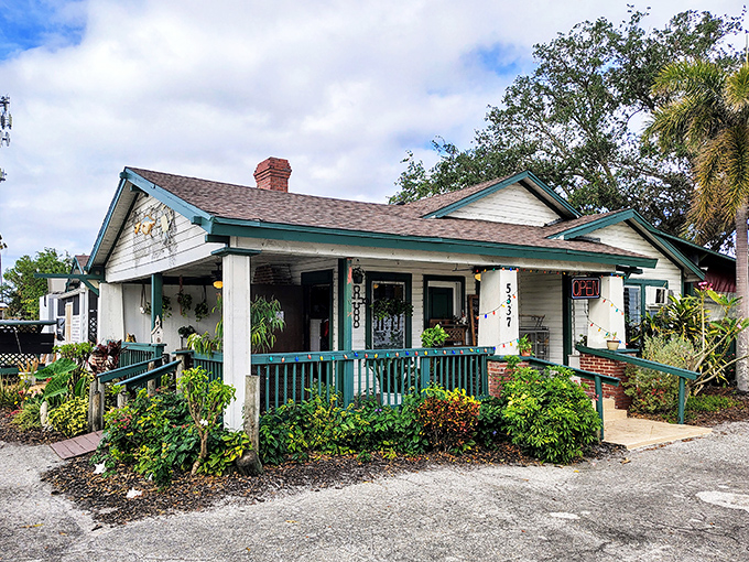 Old Florida charm isn't manufactured here&mdash;it's marinated over decades. This weathered cracker house with teal trim promises seafood authenticity without pretension.