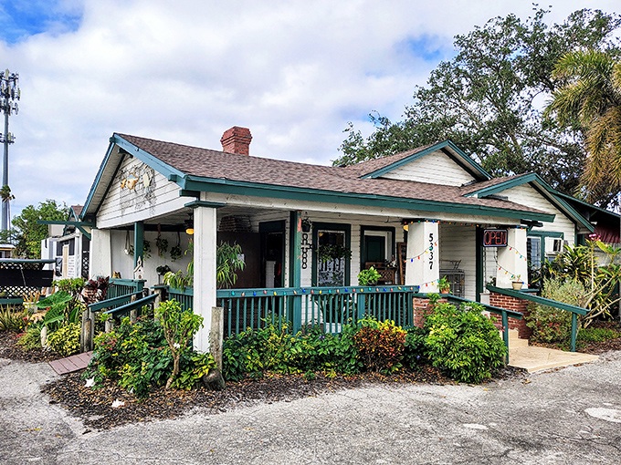 Old Florida charm doesn't get more authentic than this turquoise-trimmed cracker house. Like finding a postcard from 1950 that serves incredible seafood.