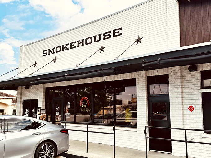 The white brick exterior of 4 Rivers Smokehouse stands like a temple to smoked meat, promising delicious salvation within those unassuming walls.