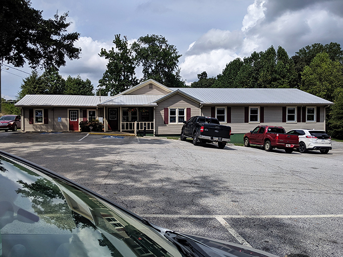 The unassuming exterior of Bar-H Barbecue stands like a beacon of hope for hungry travelers. No fancy frills, just the promise of smoky deliciousness inside.