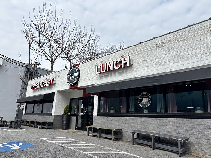 The unassuming white exterior of Atlanta Breakfast Club belies the culinary magic happening inside. Like finding a treasure map disguised as a parking ticket.
