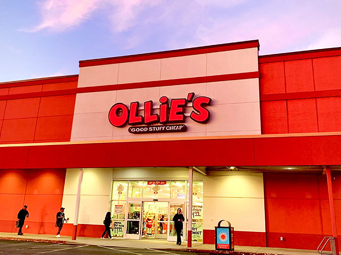 The iconic red and white facade of Ollie's beckons like a retail lighthouse, promising treasure hunters the thrill of the bargain chase.