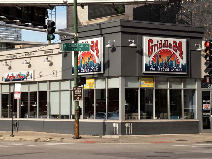 The navy blue awnings of Griddle 24 stand out on Chicago Avenue like a breakfast beacon, promising urban diner delights inside.