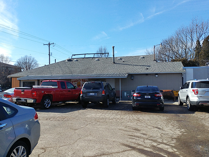 The unassuming exterior of Pauly's BBQ might fool you, but that orange siding is basically a beacon saying, "Barbecue nirvana happens here."