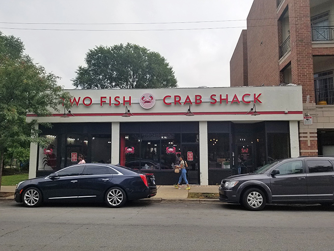 The unassuming storefront of Two Fish Crab Shack stands like a seafood beacon in Chicago, promising treasures that would make Neptune himself jealous.