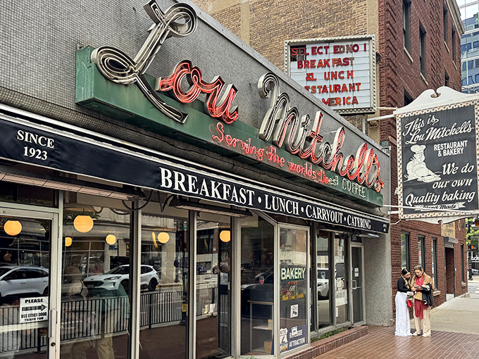The neon sign at Lou Mitchell's doesn't just glow&mdash;it beckons like an old friend promising comfort in the form of perfectly scrambled eggs and bottomless coffee.