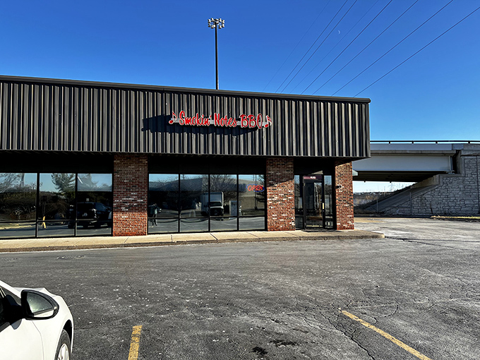 The unassuming exterior of Smokin' Notes BBQ proves the old adage: the less flashy the building, the more serious the barbecue inside.
