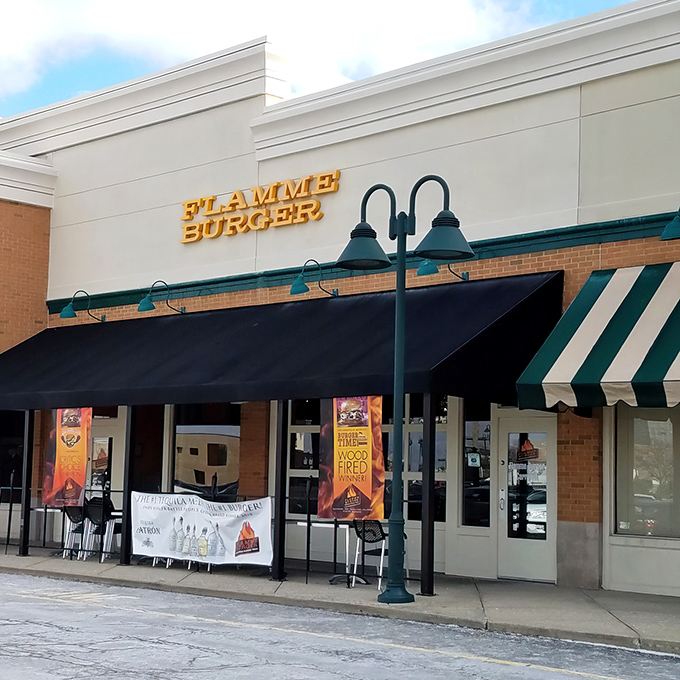 The unassuming storefront of Flamme Burger hides culinary treasures within, like finding a secret level in your favorite video game.