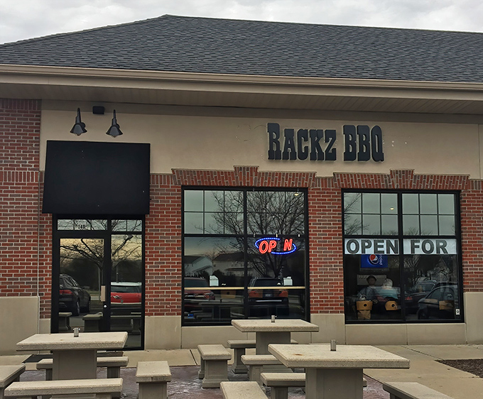 The unassuming storefront of Rackz BBQ proves once again that the best barbecue joints often hide in plain sight, like culinary speakeasies for meat lovers.