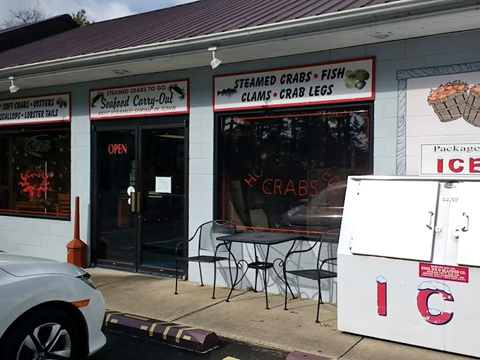 The seafood siren call of Crisfield! Those neon crab signs aren't just decoration—they're beacons guiding hungry Marylanders to their happy place.