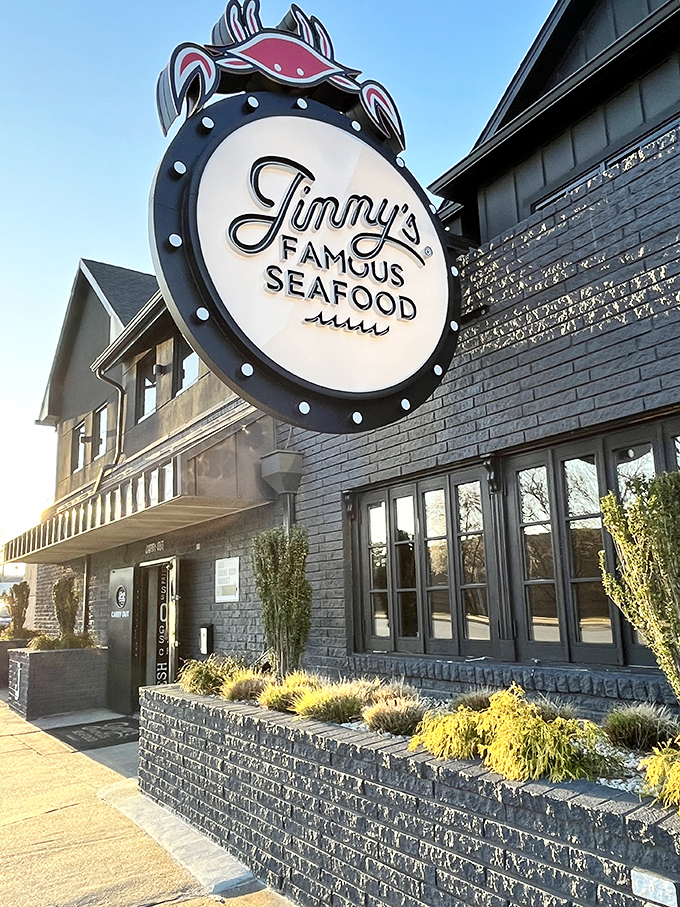 The iconic crab-topped sign beckons seafood pilgrims like a lighthouse for the hungry. Baltimore's culinary North Star has been guiding appetites for generations.