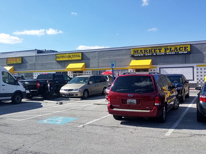 The unassuming exterior of Washington Boulevard Marketplace hides a treasure trove within. Like finding a secret level in a video game, but with better prizes.