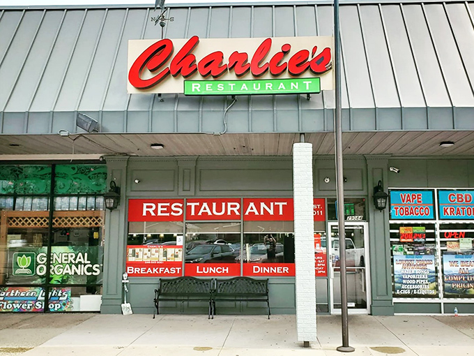 The iconic red script of Charlie's Restaurant beckons from its Madison Heights strip mall home, promising diner delights that transcend the humble surroundings.