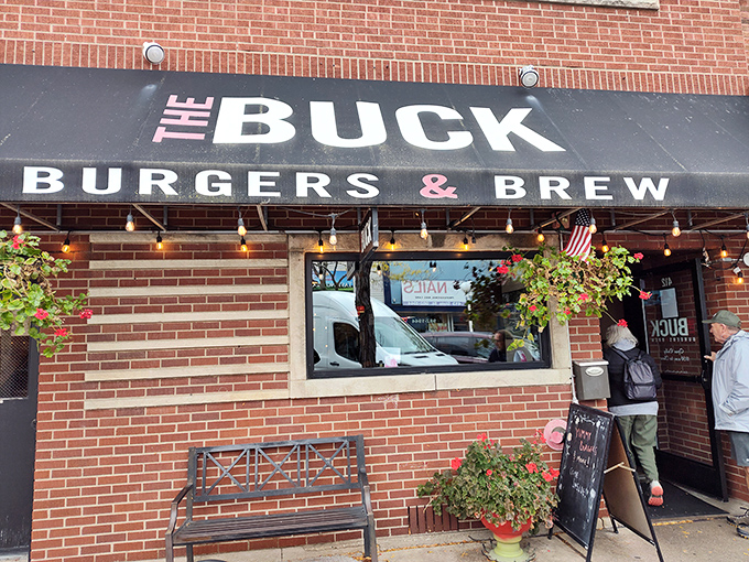 The brick facade of The Buck welcomes hungry travelers like a beacon of burger hope on St. Joseph's charming downtown strip.